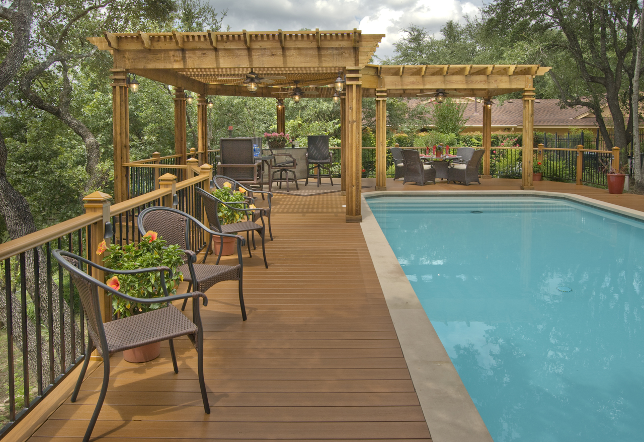 Low Maintenance Pool Deck with Cedar Pergola | Archadeck Outdoor Living